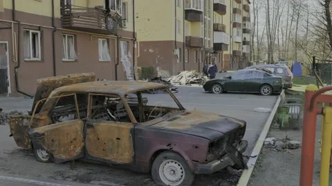 Fixed shot of a burned carcass in Boutc... | Stock Video | Pond5