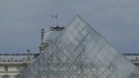Fixed shot on the pyramid of the Louvre ... | Stock Video | Pond5