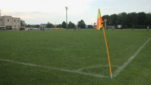 Flag on football pitch corner. Flag wavi... | Stock Video | Pond5