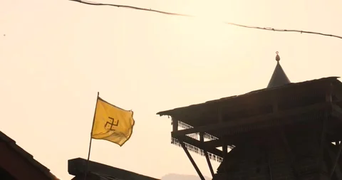 flag on roof of Indian Temple swastika i... | Stock Video | Pond5