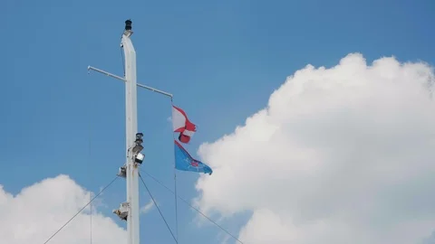 Flags from a dry bulk cargo ship in 4K. | Stock Video | Pond5