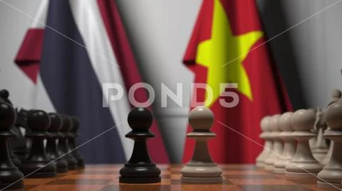 Flags of Thailand and Vietnam behind pawns on the chessboard. Chess ...