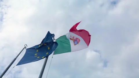 Flags waving in the wind Lake Como Italy | Stock Video | Pond5