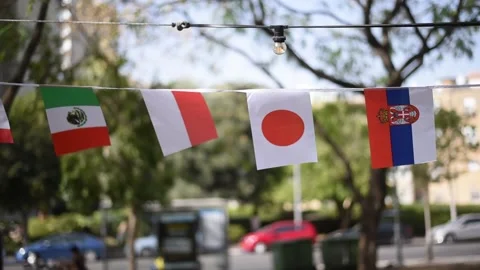 Flags of world country in city flutterin... | Stock Video | Pond5