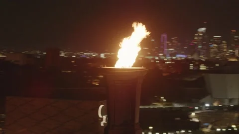 Flame in Olympic fire cauldron on pillar... | Stock Video | Pond5