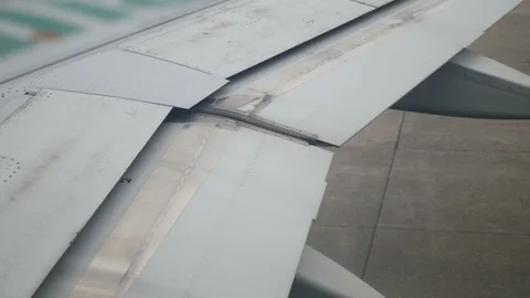 Flaps extension of wing aircraft on the ... | Stock Video | Pond5