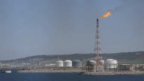 Flare stack of LNG refinery, aircraft fl... | Stock Video | Pond5