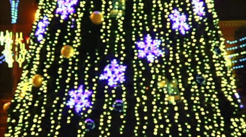 Flashing Christmas Tree With Garlands on... | Stock Video | Pond5