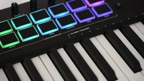 Flashing lights on a MIDI keyboard drum ... | Stock Video | Pond5