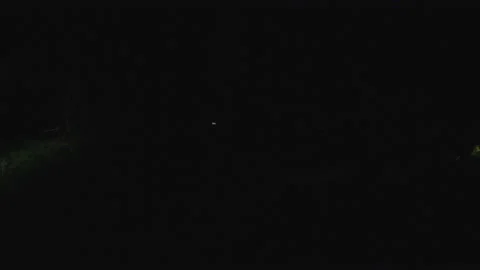 Flashlight Beams Follow a Suspicious Man... | Stock Video | Pond5