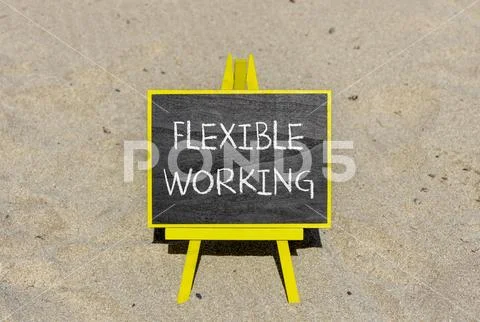 Photograph: Flexible working symbol. Concept words Flexible working on ...