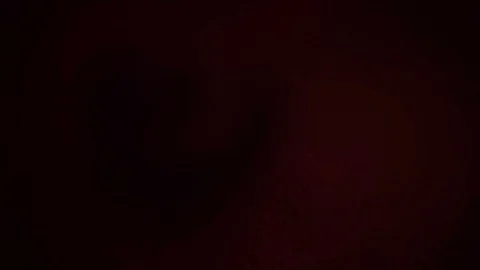Flickering red light on black background... | Stock Video | Pond5