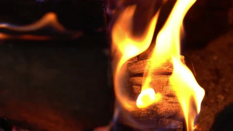 Flickering video of a burning fire at mi... | Stock Video | Pond5
