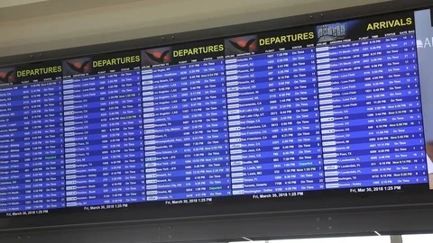Flight information display board at the ... | Stock Video | Pond5