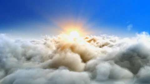 Flight over clouds, to the sun loop-able... | Stock Video | Pond5