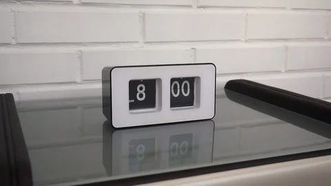 Flip clock mechanism. 8:00 PM. White bri... | Stock Video | Pond5
