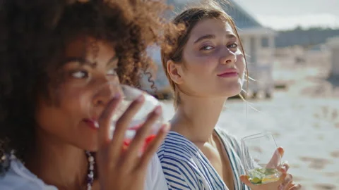 Flirting beach girl posing in summer sun... | Stock Video | Pond5