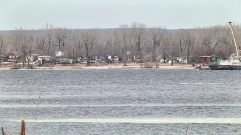 Floating down the river on a floating cr... | Stock Video | Pond5