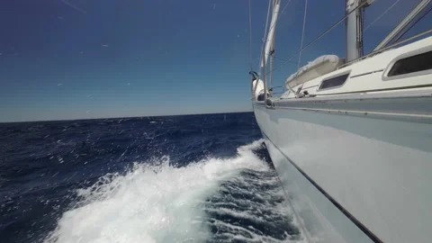 Floating sailing yacht with spread sails... | Stock Video | Pond5