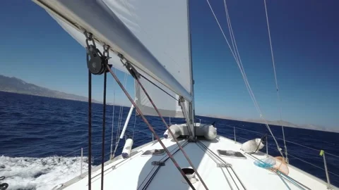 Floating sailing yacht with spread sails... | Stock Video | Pond5