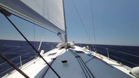 Floating sailing yacht with spread sails... | Stock Video | Pond5