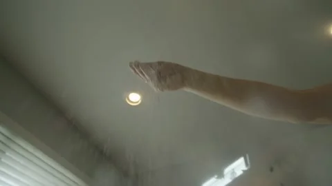 Flour falling form a hand onto a counter | Stock Video | Pond5