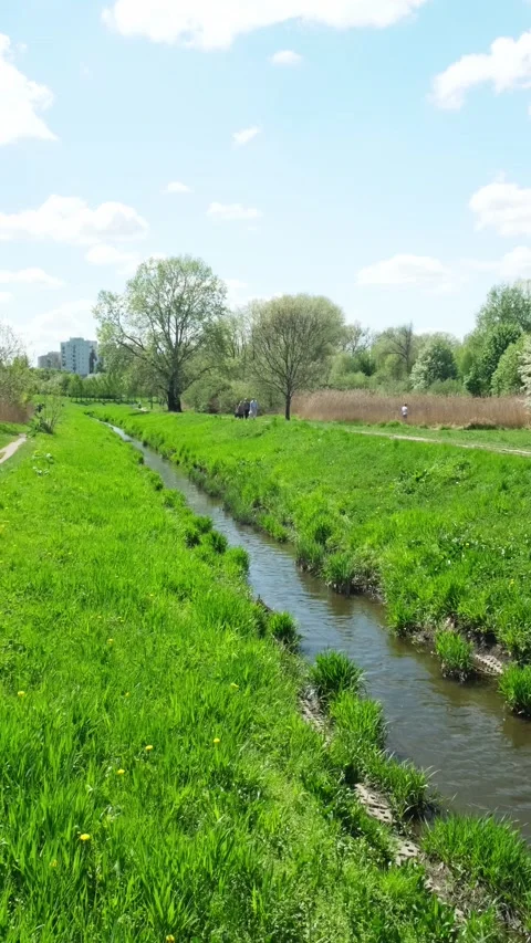 The flow of water in the channel between... | Stock Video | Pond5