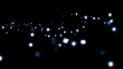 Flowing blue sprites over black backgrou... | Stock Video | Pond5