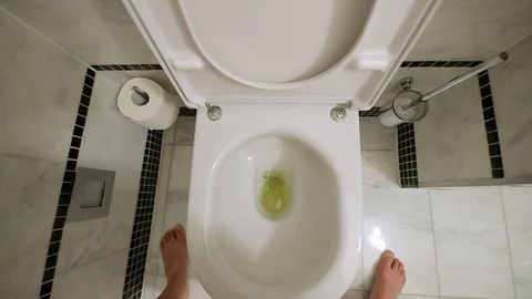 Flushing the toilet after pee | Stock Video | Pond5