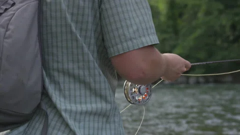 Fly Fisherman Reeling His Line in From t... | Stock Video | Pond5