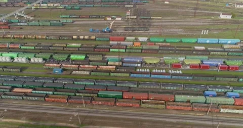 Fly over a large railway junction. Freig... | Stock Video | Pond5