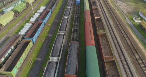 Fly over a large railway junction. Freig... | Stock Video | Pond5