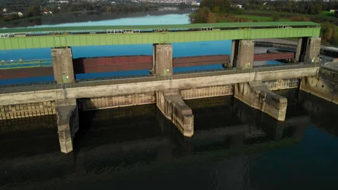 Fly by of an river barrage with a nuclea... | Stock Video | Pond5