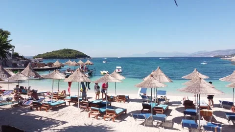 Fly through Tropical Beachclub at Ksamil... | Stock Video | Pond5