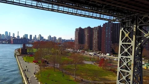 Fly Under The Williamsburg Bridge in Eas... | Stock Video | Pond5