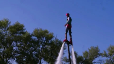 Flyboarder flying slow motion Flyboardin... | Stock Video | Pond5