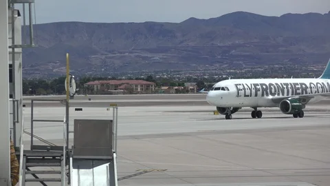 FlyFrontier logo on Frontier aircraft pu... | Stock Video | Pond5