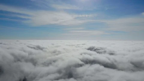 Flying above the clouds. Top view in the... | Stock Video | Pond5