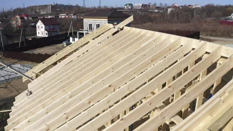 Flying above roof beams of frame house, ... | Stock Video | Pond5