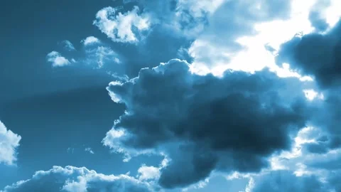 Flying alpha clouds in the sunny sky | Stock Video | Pond5