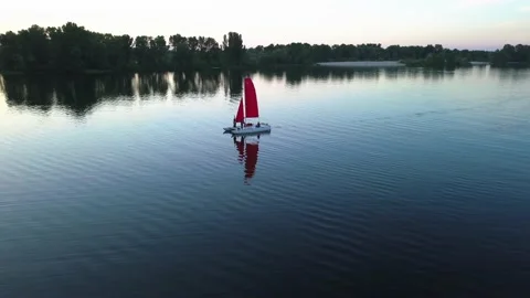 Flying around a catamaran floating on th... | Stock Video | Pond5