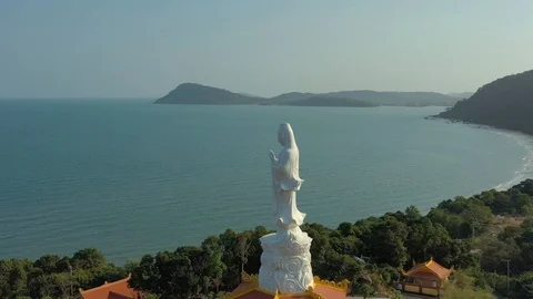 flying around statue of temple in Phu Qu... | Stock Video | Pond5
