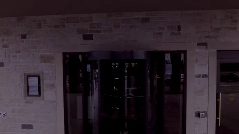 Flying away from the main door of a banq... | Stock Video | Pond5