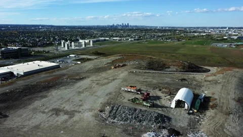 Flying backwards over Calgary landfill w... | Stock Video | Pond5