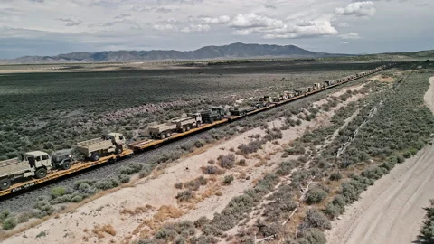 Flying backwards viewing train carrying ... | Stock Video | Pond5