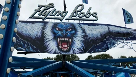 Flying bobs carnival ride spinning at th... | Stock Video | Pond5