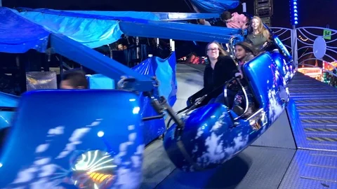 Flying bobs carnival ride spinning at th... | Stock Video | Pond5