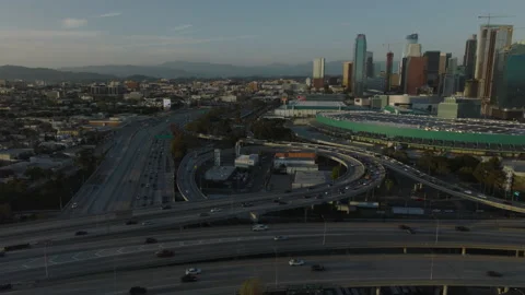 flying clockwise around freeways with wi... | Stock Video | Pond5