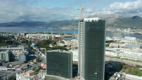 flying counter clockwise around skyscrap... | Stock Video | Pond5