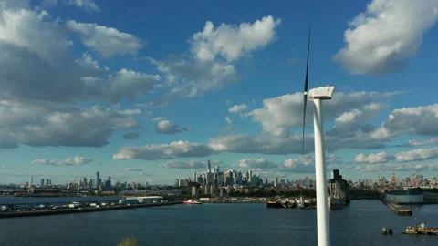 flying counter clockwise around wind tur... | Stock Video | Pond5